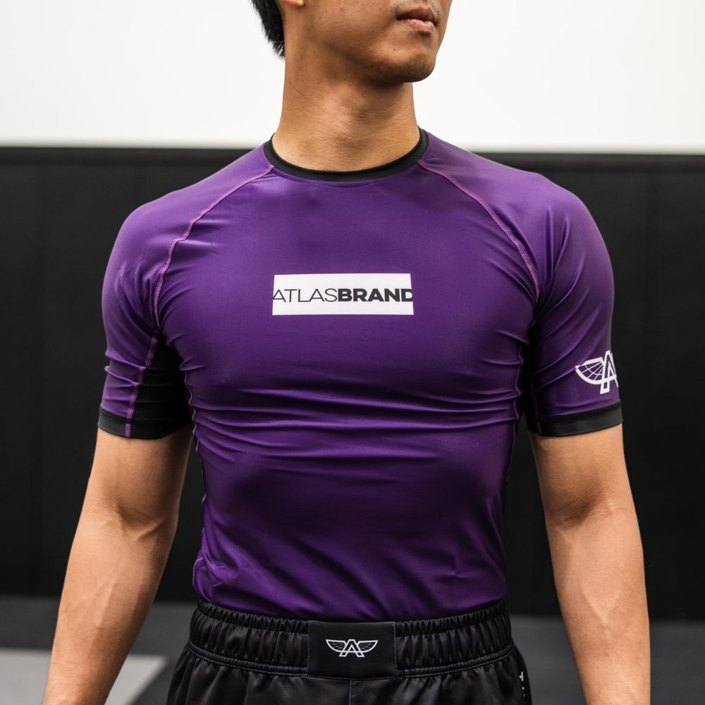Atlas BJJ Rash Guard - Competition Approved - Purple Belt – The Atlas Brand